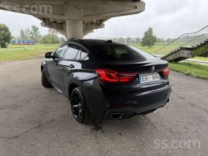 Blue BMW X6 2016 in Rezekne, with an engine capacity of 3.00 L and mileage of 231 thousand km for 22800 €, photo 6 on AUTOMOTO.COM.LV