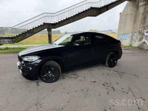 Blue BMW X6 2016 in Rezekne, with an engine capacity of 3.00 L and mileage of 231 thousand km for 22800 €, photo 7 on AUTOMOTO.COM.LV