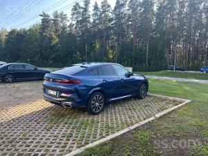 Blue BMW X6 2022 in Riga, with an engine capacity of 3.00 L and mileage of 73 thousand km for 61000 €, photo  on AUTOMOTO.COM.LV