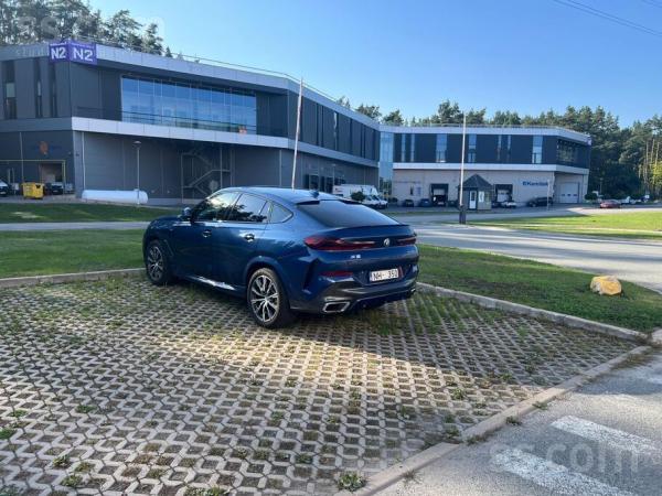 Blue BMW X6 2022 in Riga, with an engine capacity of 3.00 L and mileage of 73 thousand km for 61000 €, photo 2 on AUTOMOTO.COM.LV