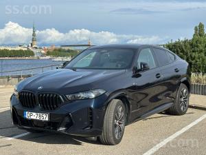 Blue BMW X6 2024 in Riga, with an engine capacity of 3.00 L and mileage of 45 thousand km for 66500 €, photo  on AUTOMOTO.COM.LV