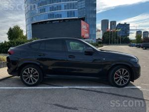 Blue BMW X6 2024 in Riga, with an engine capacity of 3.00 L and mileage of 45 thousand km for 66500 €, photo 5 on AUTOMOTO.COM.LV