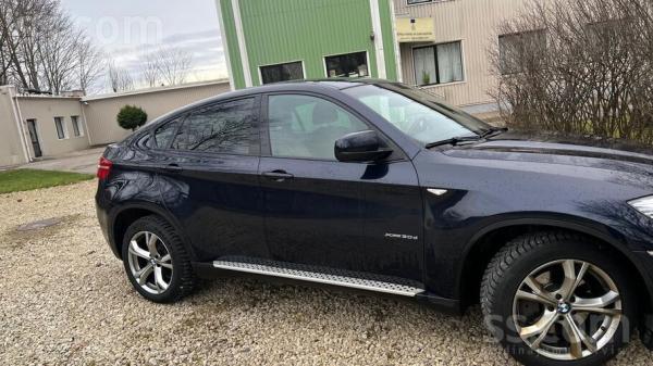 Blue BMW X6 2009 in Riga, with an engine capacity of 3.00 L and mileage of 317 thousand km for 10999 €, photo 2 on AUTOMOTO.COM.LV