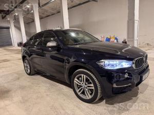 Blue BMW X6 2015 in Riga, with an engine capacity of 3.00 L and mileage of 158 thousand km for 26600 €, photo 4 on AUTOMOTO.COM.LV