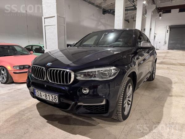 Blue BMW X6 2015 in Riga, with an engine capacity of 3.00 L and mileage of 158 thousand km for 26600 €, photo 5 on AUTOMOTO.COM.LV