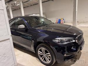Blue BMW X6 2015 in Riga, with an engine capacity of 3.00 L and mileage of 158 thousand km for 26600 €, photo 11 on AUTOMOTO.COM.LV
