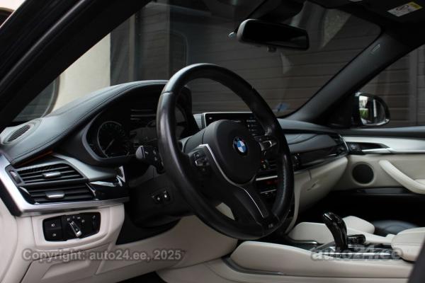 Blue BMW X6 2017 in Riga, with an engine capacity of 3.00 L and mileage of 106 thousand km for 33900 €, photo 11 on AUTOMOTO.COM.LV