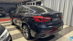 Blue BMW X6 2017 in Marupe, with an engine capacity of 3.00 L and mileage of 146 thousand km for 28990 €, photo 4 on AUTOMOTO.COM.LV