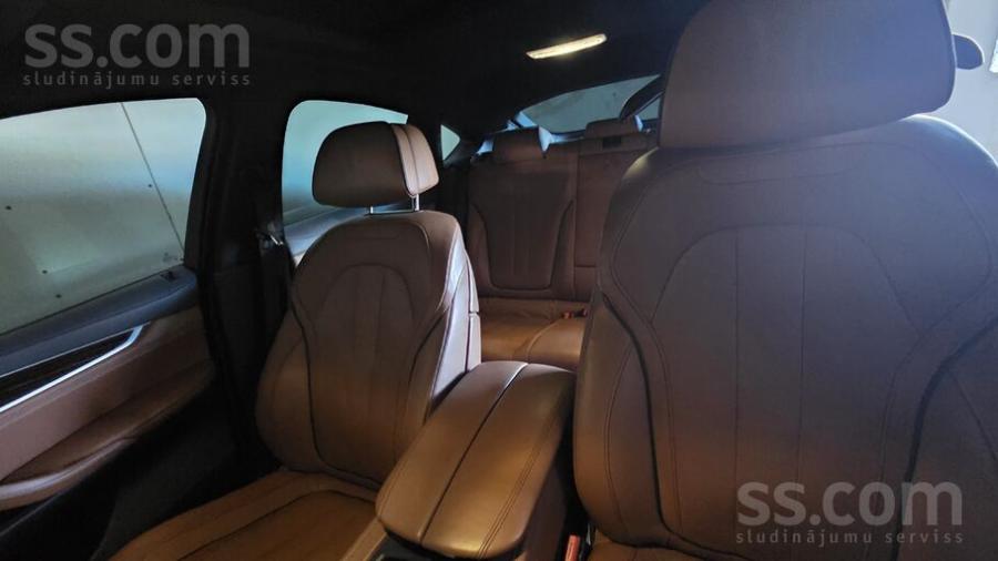 Blue BMW X6 2017 in Riga, with an engine capacity of 3.00 L and mileage of 213 thousand km for 26400 €, photo 5 on AUTOMOTO.COM.LV