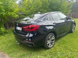 Blue BMW X6 2018 in Riga, with an engine capacity of 3.00 L and mileage of 197 thousand km for 33500 €, photo 3 on AUTOMOTO.COM.LV
