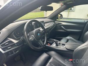 Blue BMW X6 2018 in Riga, with an engine capacity of 3.00 L and mileage of 197 thousand km for 33500 €, photo 4 on AUTOMOTO.COM.LV