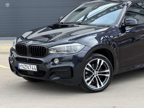 Blue BMW X6 2018 in Jonava, with an engine capacity of 2.99 L and mileage of 235 thousand km for 23990 €, photo 3 on AUTOMOTO.COM.LV