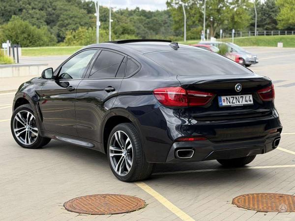 Blue BMW X6 2018 in Jonava, with an engine capacity of 2.99 L and mileage of 235 thousand km for 23990 €, photo 5 on AUTOMOTO.COM.LV