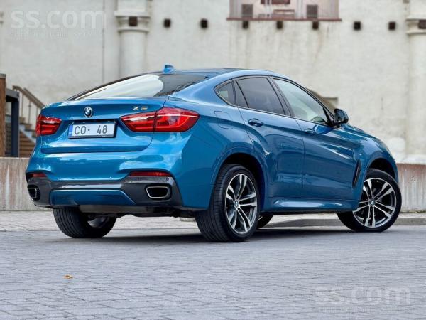 Blue BMW X6 2018 in Jelgava, with an engine capacity of 3.00 L and mileage of 102 thousand km for 36000 €, photo 4 on AUTOMOTO.COM.LV