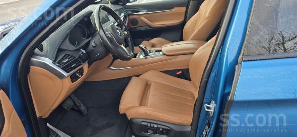 Blue BMW X6 2019 in Riga, with an engine capacity of 3.00 L and mileage of 117 thousand km for 35000 €, photo 6 on AUTOMOTO.COM.LV