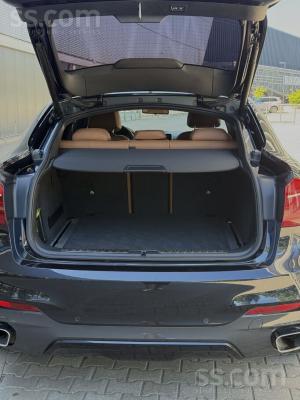 Blue BMW X6 2019 in Riga, with an engine capacity of 3.00 L and mileage of 98 thousand km for 32300 €, photo 21 on AUTOMOTO.COM.LV