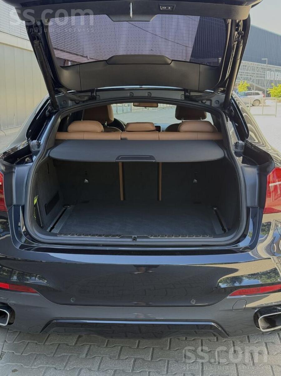 Blue BMW X6 2019 in Riga, with an engine capacity of 3.00 L and mileage of 98 thousand km for 32300 €, photo 21 on AUTOMOTO.COM.LV