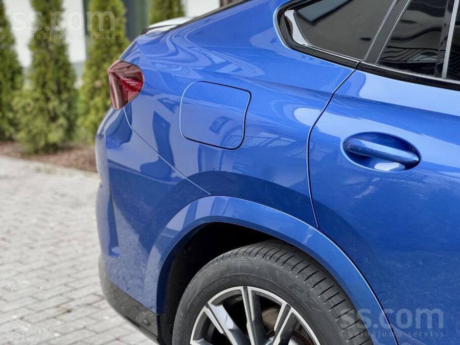 Blue BMW X6 2020 in Riga, with an engine capacity of 3.00 L and mileage of 77 thousand km for 54800 €, photo 12 on AUTOMOTO.COM.LV