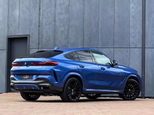 Blue BMW X6 2020 in Riga, with an engine capacity of 3.00 L and mileage of 133 thousand km for 51500 €, photo 28 on AUTOMOTO.COM.LV