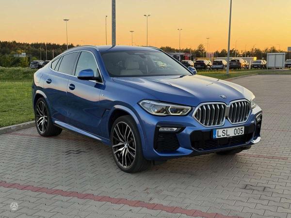 Blue BMW X6 2020 in Vilnius, with an engine capacity of 2.99 L and mileage of 74 thousand km for 54500 €, photo 8 on AUTOMOTO.COM.LV