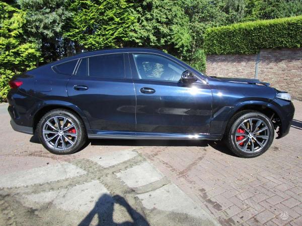 Blue BMW X6 2024 in Panevezys, with an engine capacity of 3.00 L and mileage of 35 thousand km for 33000 €, photo 5 on AUTOMOTO.COM.LV