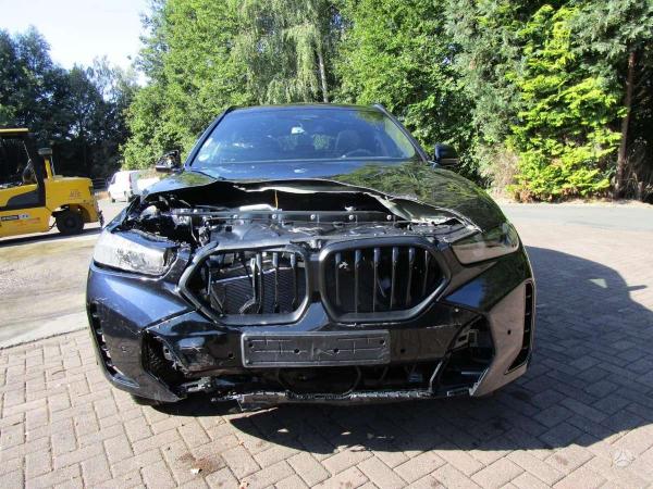 Blue BMW X6 2024 in Panevezys, with an engine capacity of 3.00 L and mileage of 35 thousand km for 33000 €, photo 6 on AUTOMOTO.COM.LV