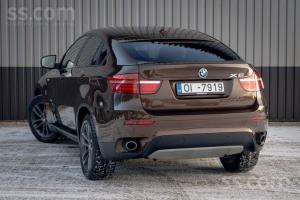 Brown BMW X6 2014 in Talsi, with an engine capacity of 3.00 L and mileage of 142 thousand km for 19950 €, photo 4 on AUTOMOTO.COM.LV