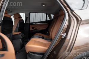 Brown BMW X6 2014 in Talsi, with an engine capacity of 3.00 L and mileage of 142 thousand km for 19950 €, photo 10 on AUTOMOTO.COM.LV