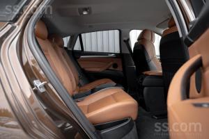 Brown BMW X6 2014 in Talsi, with an engine capacity of 3.00 L and mileage of 142 thousand km for 19950 €, photo 11 on AUTOMOTO.COM.LV