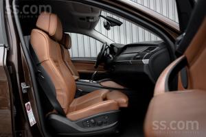Brown BMW X6 2014 in Talsi, with an engine capacity of 3.00 L and mileage of 142 thousand km for 19950 €, photo 12 on AUTOMOTO.COM.LV