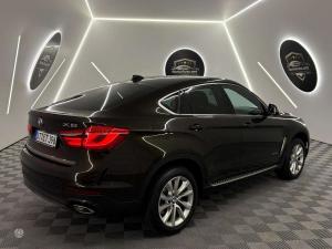Brown BMW X6 2015 in Marijampole, with an engine capacity of 2.99 L and mileage of 215 thousand km for 22999 €, photo 32 on AUTOMOTO.COM.LV