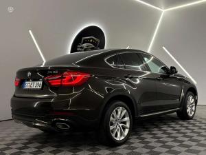 Brown BMW X6 2015 in Marijampole, with an engine capacity of 2.99 L and mileage of 215 thousand km for 22999 €, photo 37 on AUTOMOTO.COM.LV