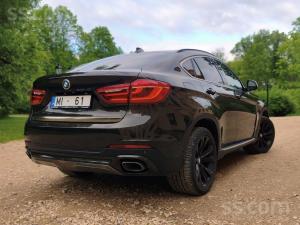 Brown BMW X6 2015 in Preili, with an engine capacity of 3.00 L and mileage of 257 thousand km for 20995 €, photo 5 on AUTOMOTO.COM.LV