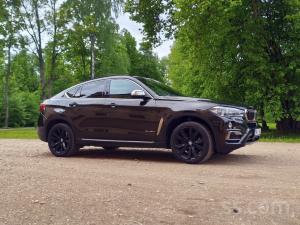 Brown BMW X6 2015 in Preili, with an engine capacity of 3.00 L and mileage of 257 thousand km for 20995 €, photo 7 on AUTOMOTO.COM.LV