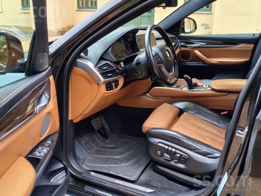 Brown BMW X6 2015 in Preili, with an engine capacity of 3.00 L and mileage of 257 thousand km for 20995 €, photo 13 on AUTOMOTO.COM.LV