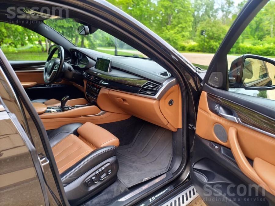 Brown BMW X6 2015 in Preili, with an engine capacity of 3.00 L and mileage of 257 thousand km for 20995 €, photo 21 on AUTOMOTO.COM.LV