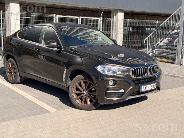 Brown BMW X6 2015 in Riga, with an engine capacity of 3.00 L and mileage of 217 thousand km for 20000 €, photo 3 on AUTOMOTO.COM.LV