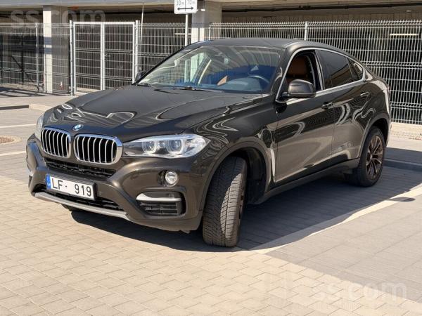 Brown BMW X6 2015 in Riga, with an engine capacity of 3.00 L and mileage of 217 thousand km for 20000 €, photo 4 on AUTOMOTO.COM.LV