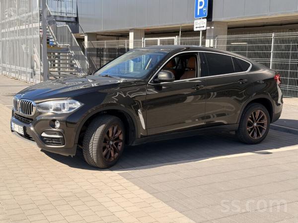 Brown BMW X6 2015 in Riga, with an engine capacity of 3.00 L and mileage of 217 thousand km for 20000 €, photo 5 on AUTOMOTO.COM.LV
