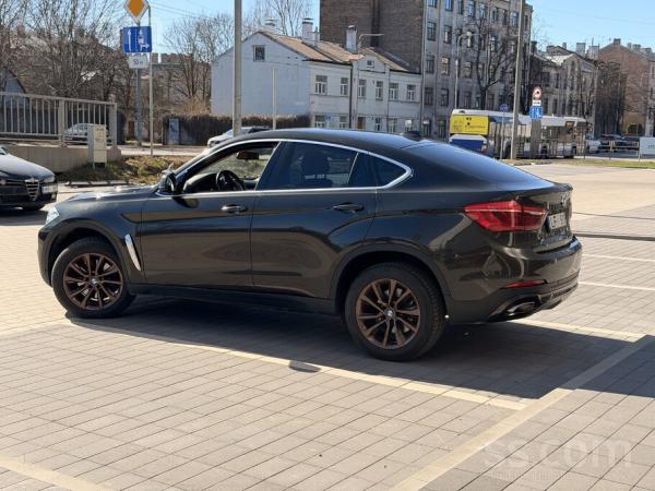 Brown BMW X6 2015 in Riga, with an engine capacity of 3.00 L and mileage of 217 thousand km for 20000 €, photo 7 on AUTOMOTO.COM.LV