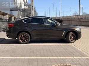 Brūns BMW X6 2015 Rīga, ar dzinēja tilpumu 3.00 L un nobraukumu 217 tūkst. km par 20000 €, foto 12 vietnē AUTOMOTO.COM.LV