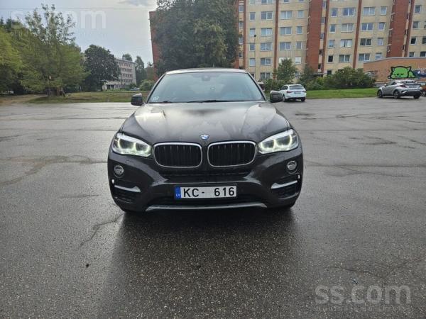 Brown BMW X6 2015 in Riga, with an engine capacity of 3.00 L and mileage of 231 thousand km for 17900 €, photo 1 on AUTOMOTO.COM.LV