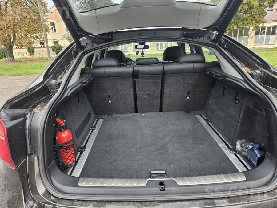 Brown BMW X6 2015 in Riga, with an engine capacity of 3.00 L and mileage of 231 thousand km for 17900 €, photo 6 on AUTOMOTO.COM.LV