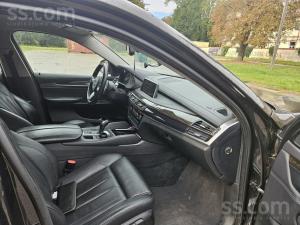 Brown BMW X6 2015 in Riga, with an engine capacity of 3.00 L and mileage of 231 thousand km for 17900 €, photo 7 on AUTOMOTO.COM.LV
