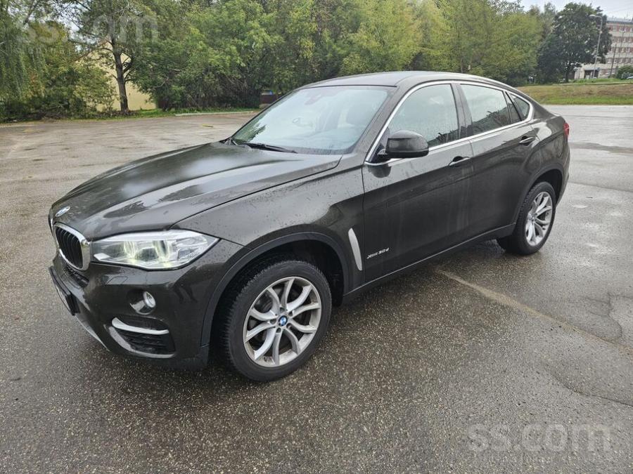 Brown BMW X6 2015 in Riga, with an engine capacity of 3.00 L and mileage of 231 thousand km for 17900 €, photo 9 on AUTOMOTO.COM.LV