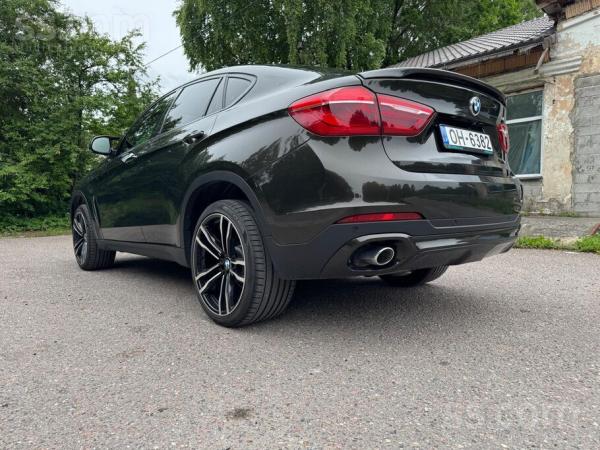 Brown BMW X6 2016 in Riga, with an engine capacity of 3.00 L and mileage of 181 thousand km for 25600 €, photo 6 on AUTOMOTO.COM.LV