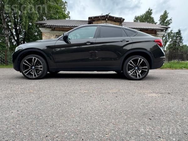 Brown BMW X6 2016 in Riga, with an engine capacity of 3.00 L and mileage of 181 thousand km for 25600 €, photo 7 on AUTOMOTO.COM.LV