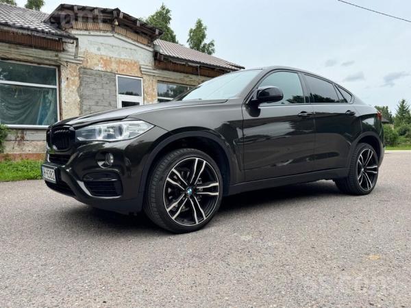 Brown BMW X6 2016 in Riga, with an engine capacity of 3.00 L and mileage of 181 thousand km for 25600 €, photo 8 on AUTOMOTO.COM.LV