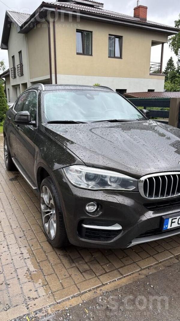 Brown BMW X6 2016 in Riga, with an engine capacity of 3.00 L and mileage of 0 thousand km for 16790 €, photo 2 on AUTOMOTO.COM.LV