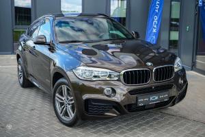 Brown BMW X6 2016 in Kaunas, with an engine capacity of 3.00 L and mileage of 144 thousand km for 27450 €, photo 4 on AUTOMOTO.COM.LV